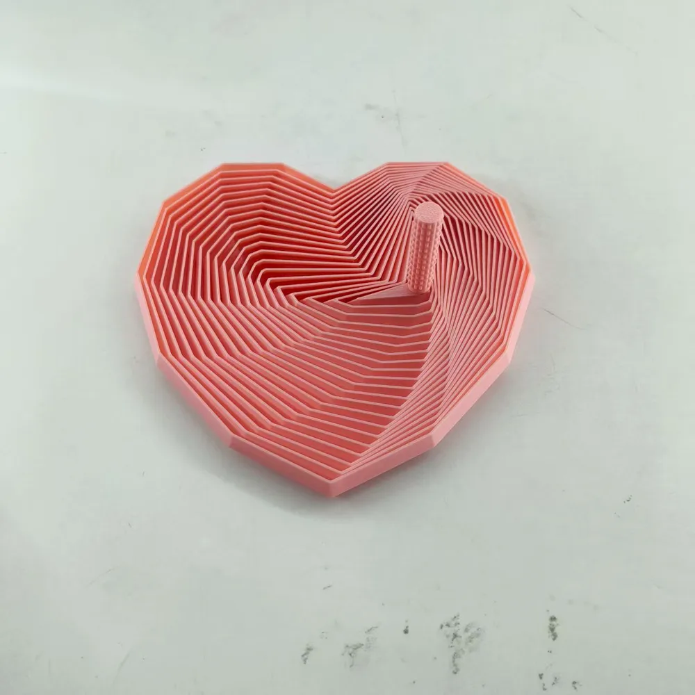 Heart-shaped stress relief toys - Free 3D Print Model - MakerWorld