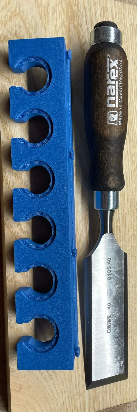 Wood chisel support for peg board by Didu - MakerWorld