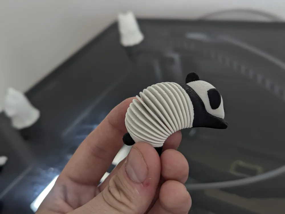 Flexi Mini Panda [Slinky] - Free 3D Print Model - MakerWorld