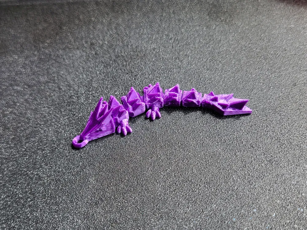 flexi dragon earrings - Free 3D Print Model - MakerWorld