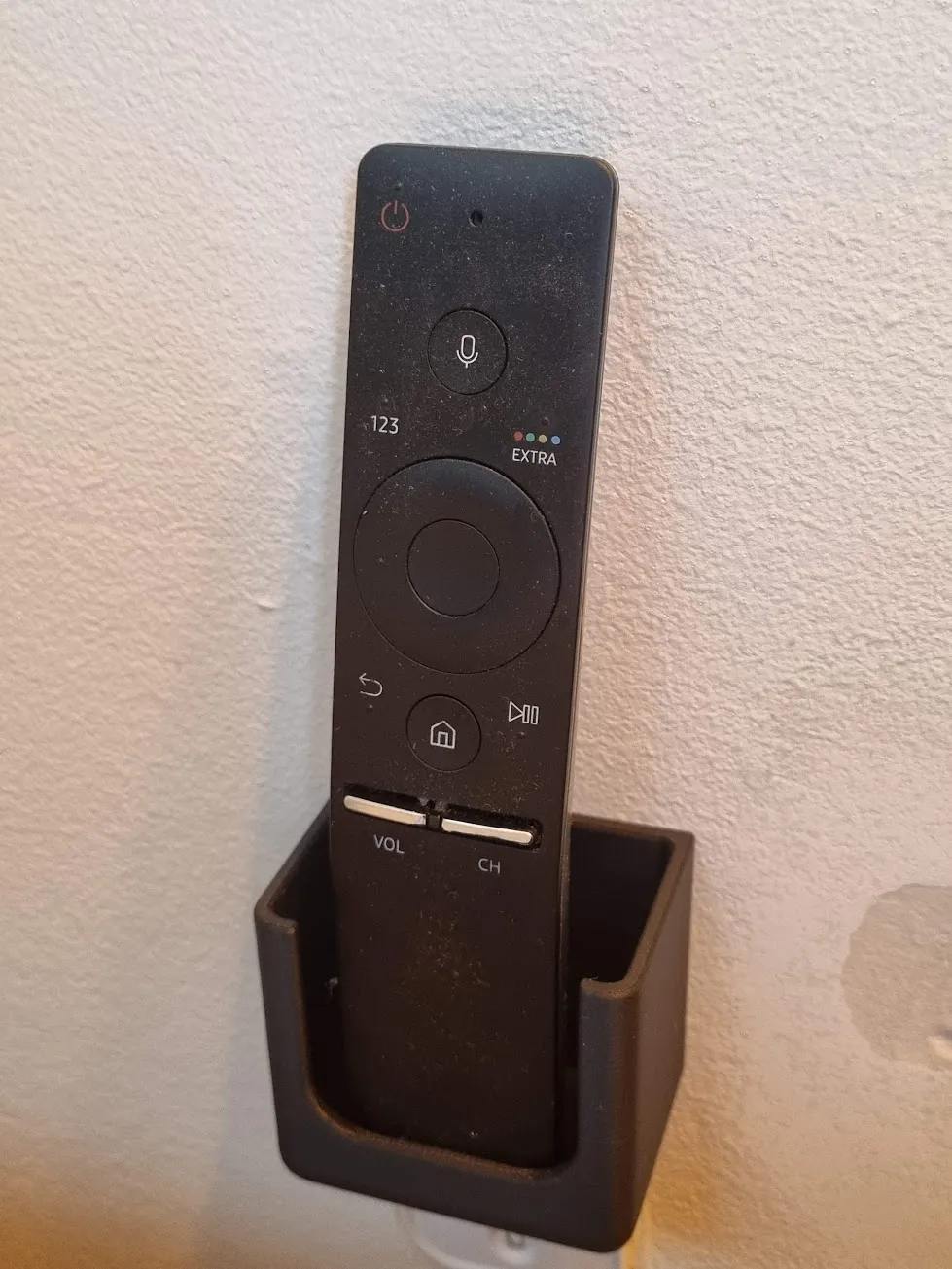 Remote control holder wall mounted by Toxvaerd - MakerWorld