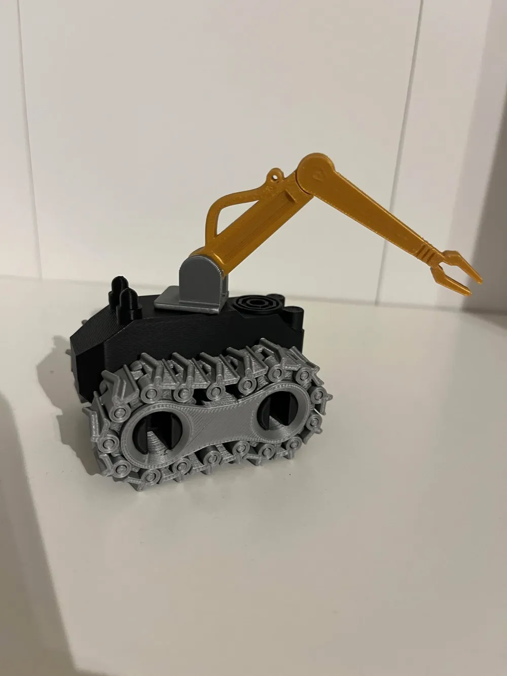 Robotic machine with Moving Tracks & Arm by Abbe MakerWorld: Download ...
