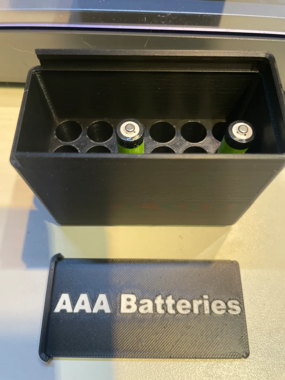 Gridfinity with pin AAA Battery Bin with Lid Remixed by Demig74 - MakerWorld