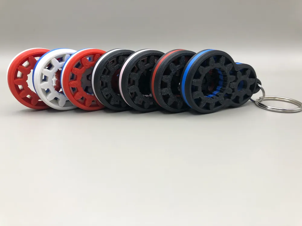 Gear Fidget Keychain 3 colors Remixed by Manio 3DP MakerWorld: Download ...