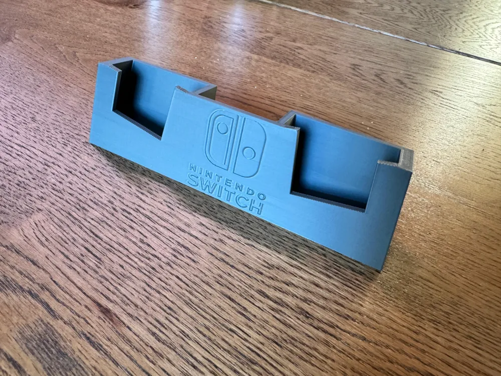 Switch Aolion Portable Joycon Grip Stand by Piet De Vries - MakerWorld