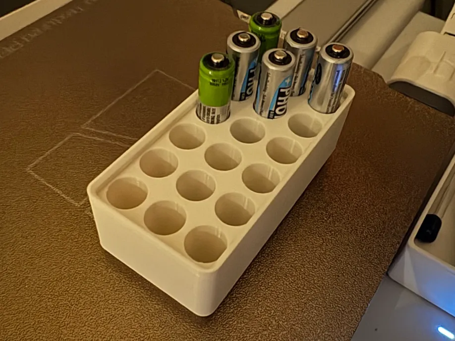 Gridfinity AAA battery holder Remixed by GreatRedSunCreations - MakerWorld