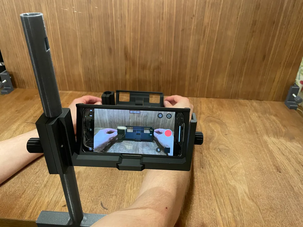 iPhone Holder—For Instructional Videos—iPhone 12 Max to 16 Plus - Free 3D Print Model - MakerWorld