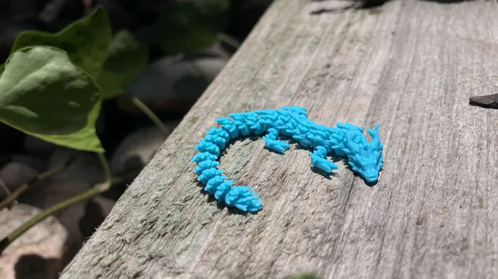 World's tiniest articulated dragon - Free 3D Print Model - MakerWorld