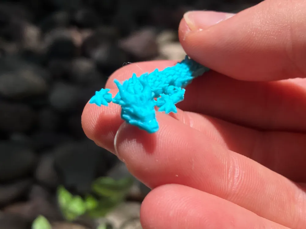 World's tiniest articulated dragon - Free 3D Print Model - MakerWorld