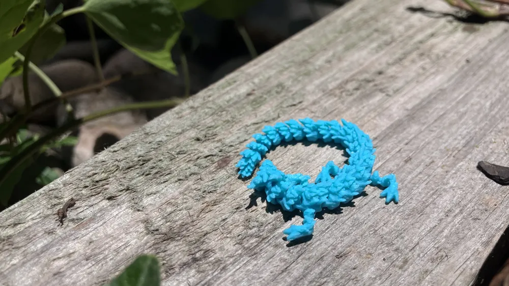 World's tiniest articulated dragon - Free 3D Print Model - MakerWorld