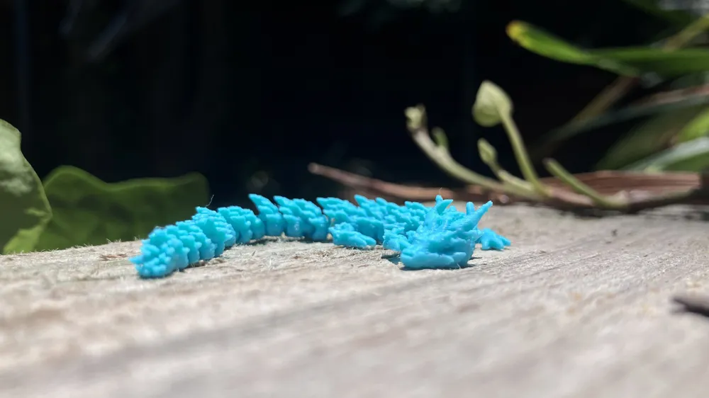 World's tiniest articulated dragon - Free 3D Print Model - MakerWorld
