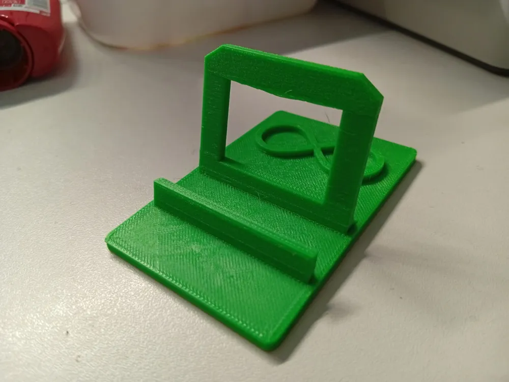 Phone Stand w/ Infinite sign - Free 3D Print Model - MakerWorld