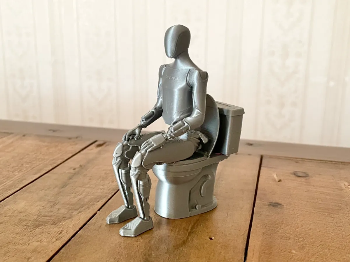 Tesla Optimus on Toilet - Free 3D Print Model - MakerWorld