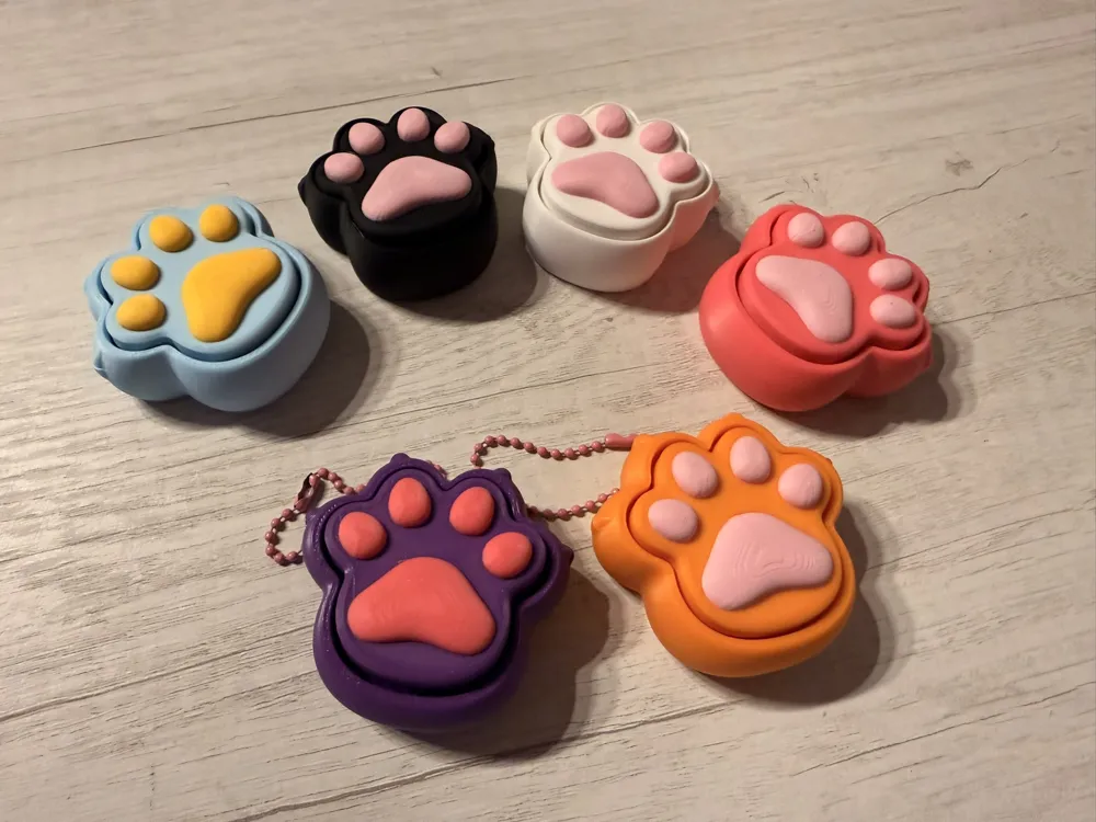 Clicky Paw keychains v2 - Free 3D Print Model - MakerWorld