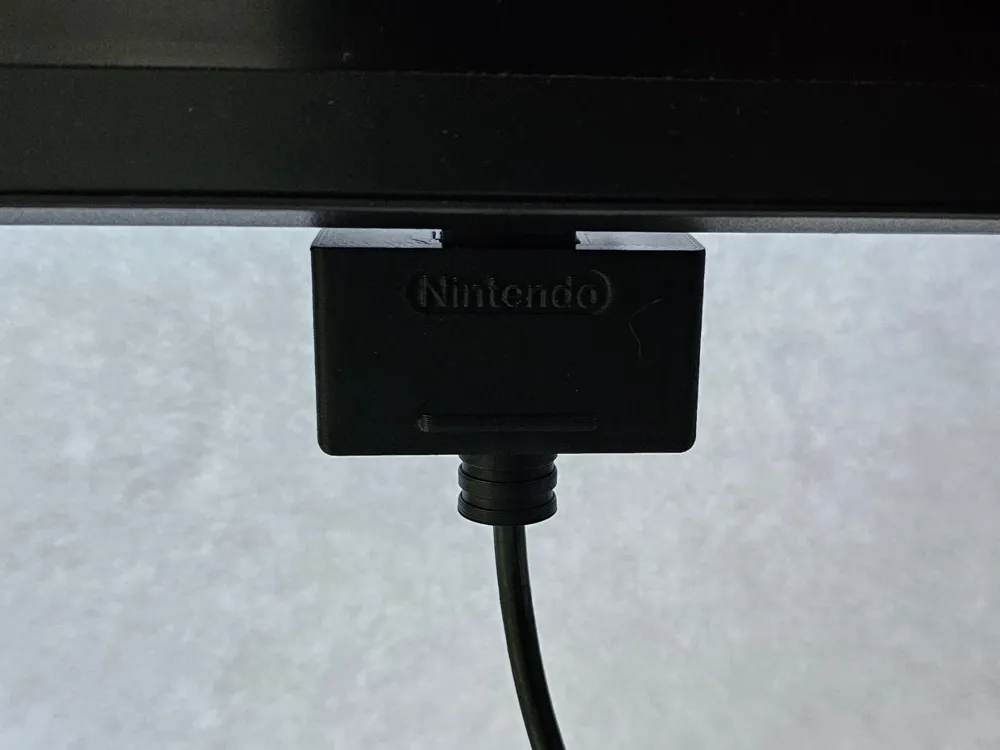 Parametric SNES controller cable housing by void93 - MakerWorld