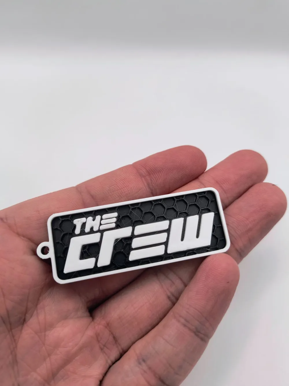 The crew logo keychain - Free 3D Print Model - MakerWorld