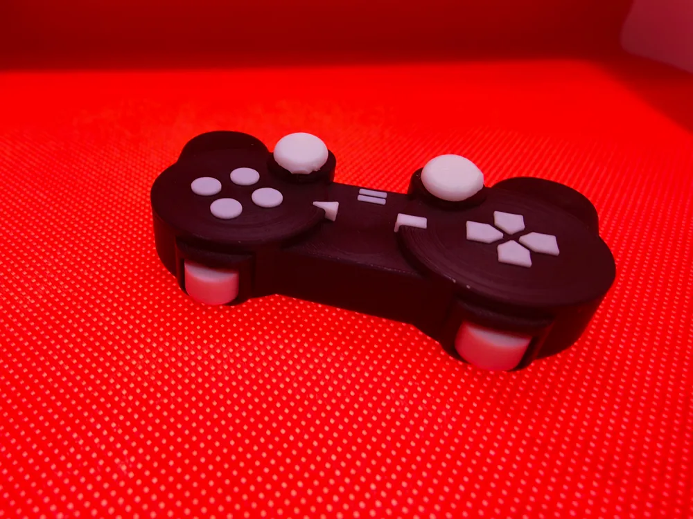 PlayStation Controller Inspired Fidget Toy by jinivus - MakerWorld