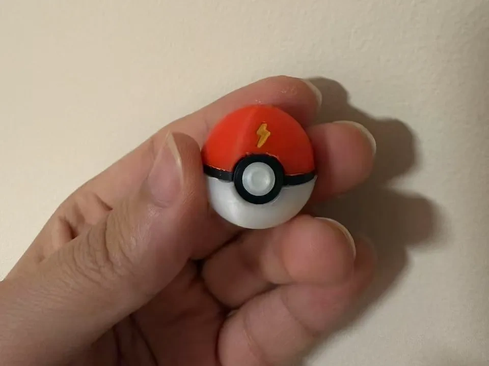 Miniature Poké Ball with lightning bolt marking, mini pokeball, Pikachu ...
