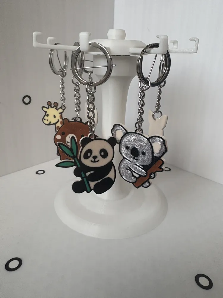 Rotating keychain display - Free 3D Print Model - MakerWorld