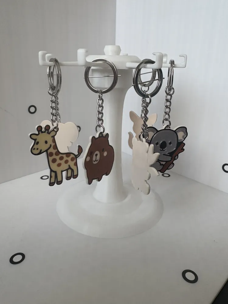 Rotating keychain display - Free 3D Print Model - MakerWorld