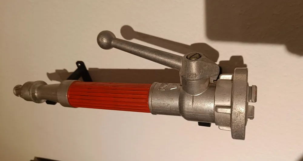 Wall mount for a fire hose nozzle by Venti MakerWorld: Download Free 3D ...