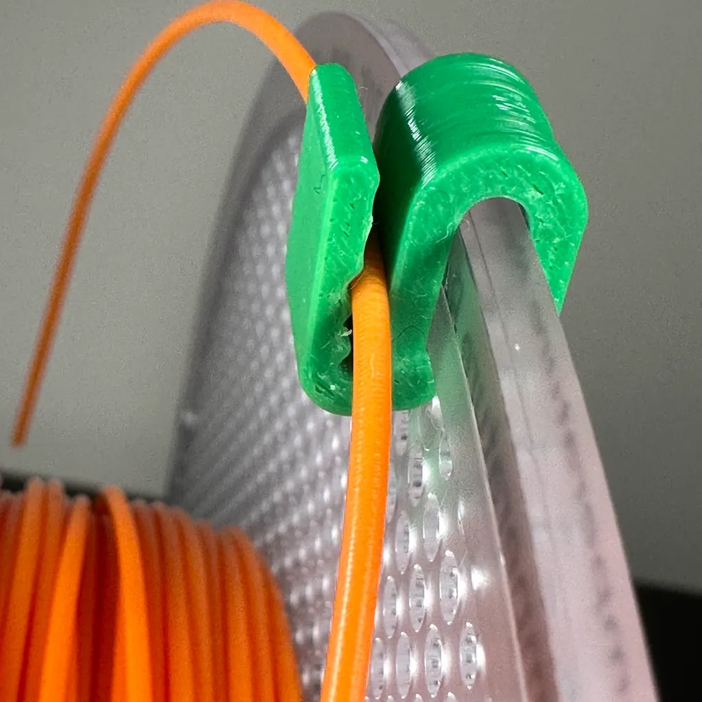 Low profile snap-on secure filament clip for Bambu Lab reusable spool by DWdesigns - MakerWorld