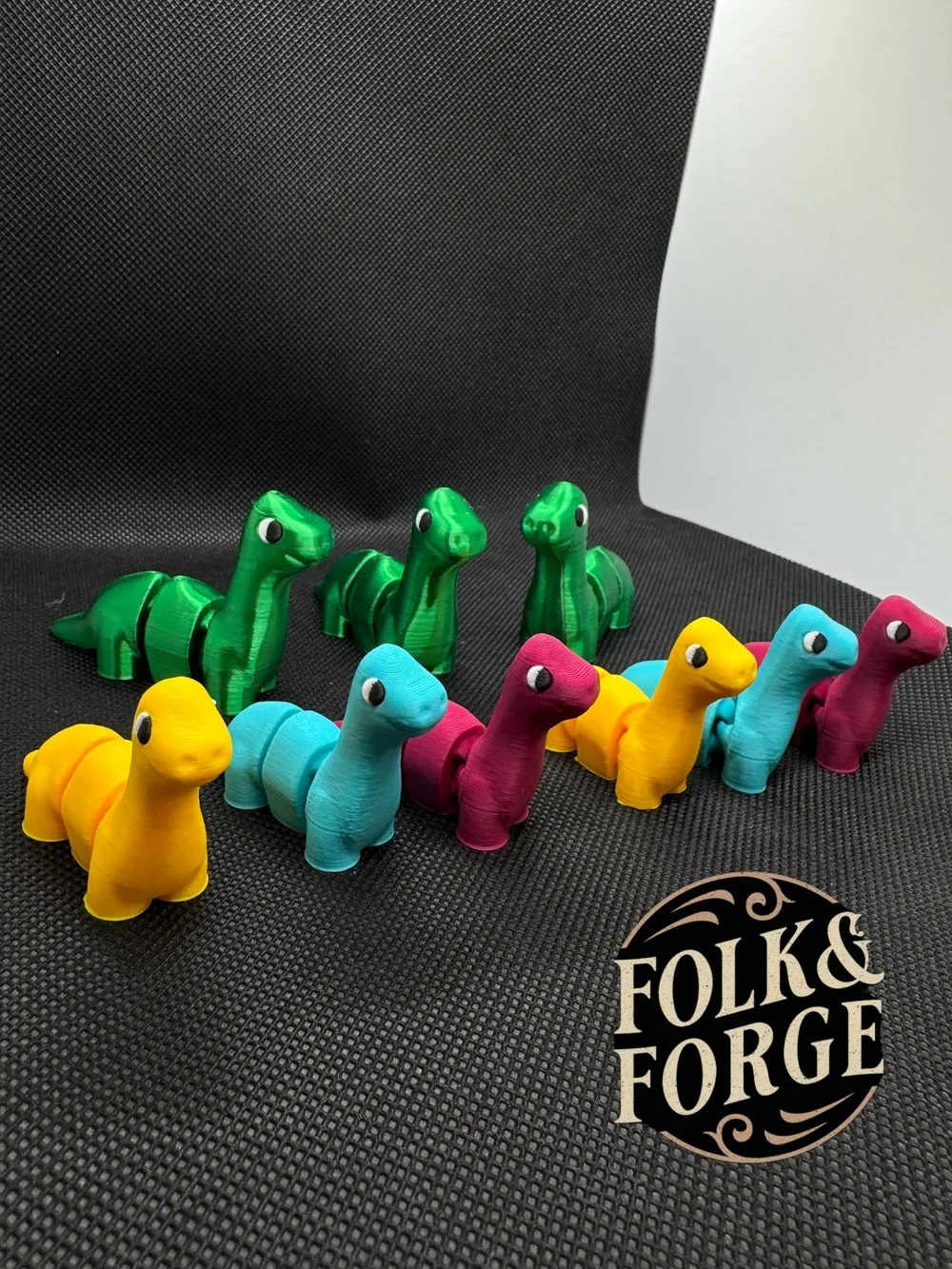 Little Longneck Fidget Dinosaur by Folk & Forge MakerWorld: Download Free 3D Models