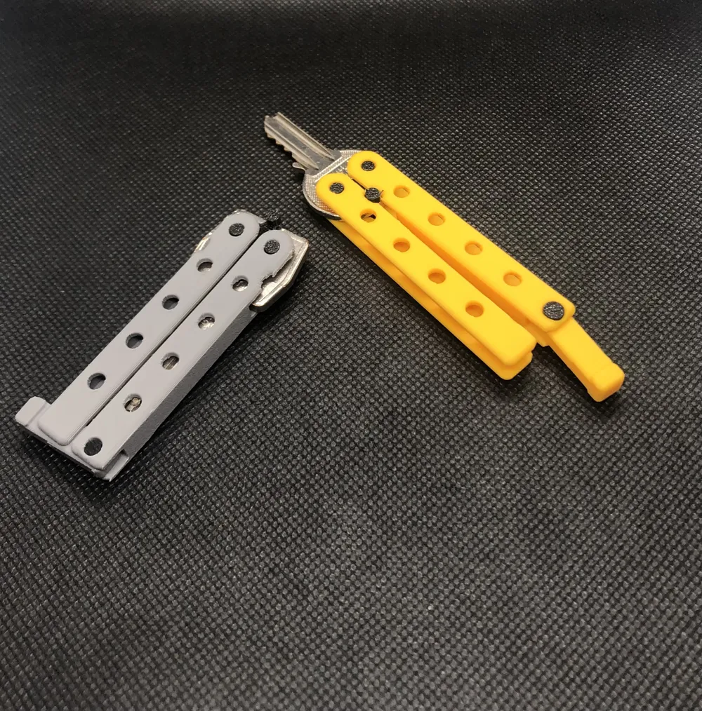 Balikey - butterfly knife for keys by Noir MakerWorld: Download Free 3D ...