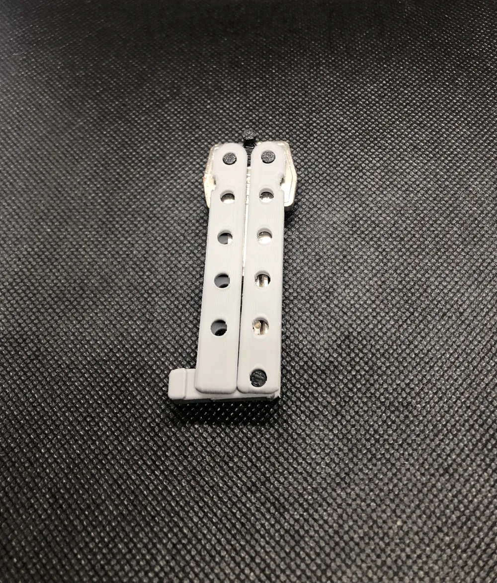 Balikey - butterfly knife for keys by Noir MakerWorld: Download Free 3D ...