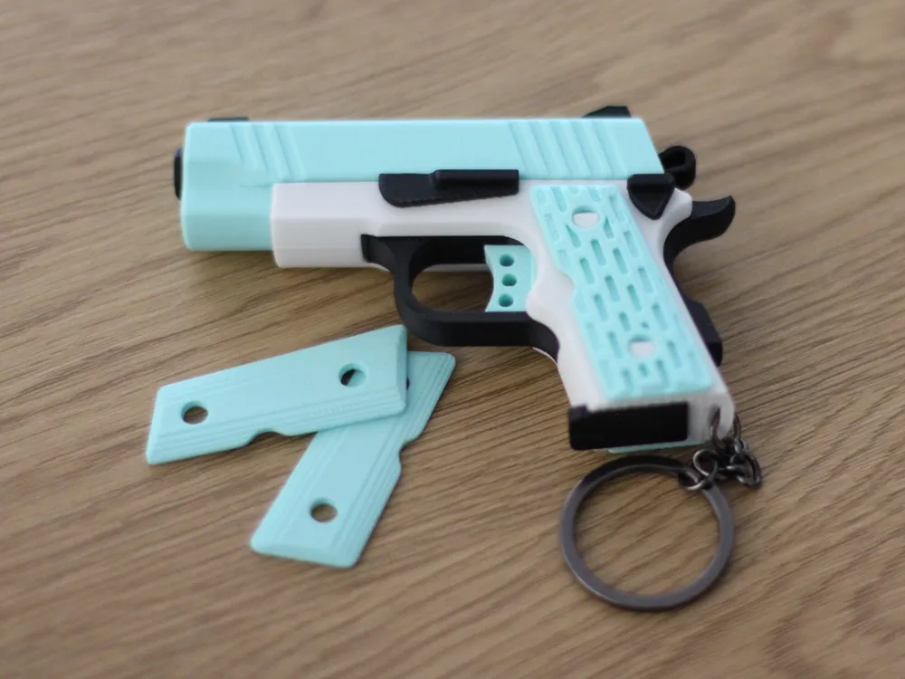 Colt 1911 Fidget Keychain – Perforated Grip Mod - Free 3D Print Model ...