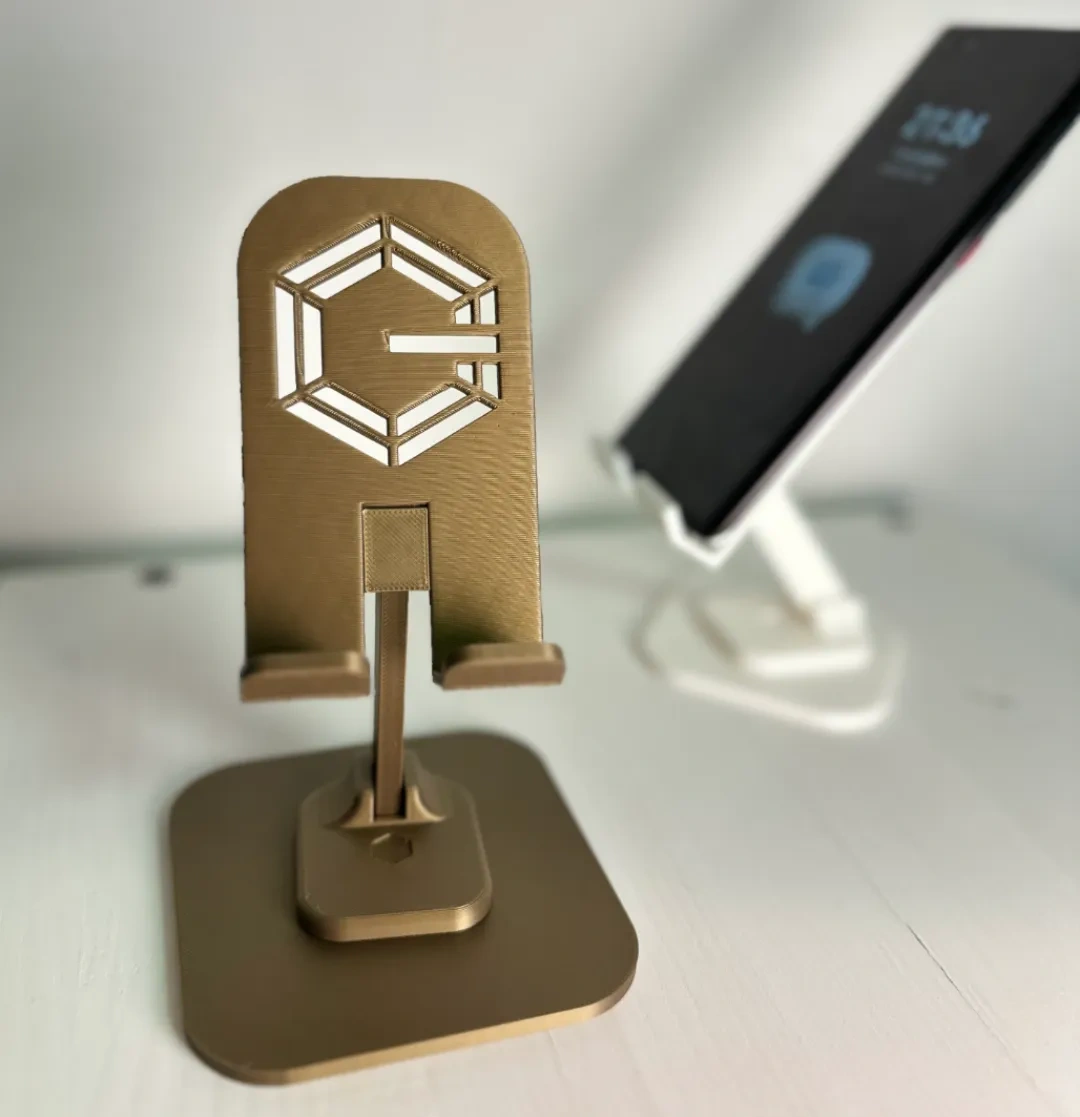 360-Degree Rotating and Height-Adjustable Cell Phone Stand by GavinK ...