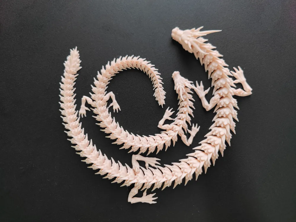 A little white dragon - MakerWorld 3D Model | 3Drop