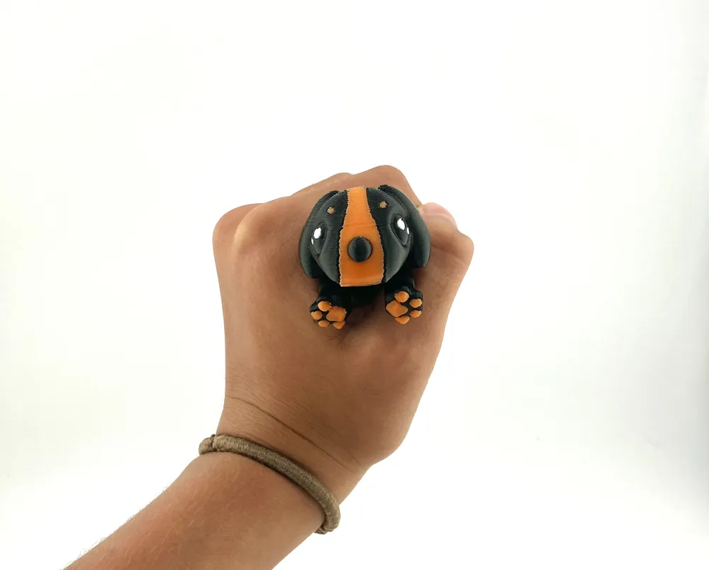 Flexi Dog Articulated Fidget Toy - Free 3D Print Model - MakerWorld