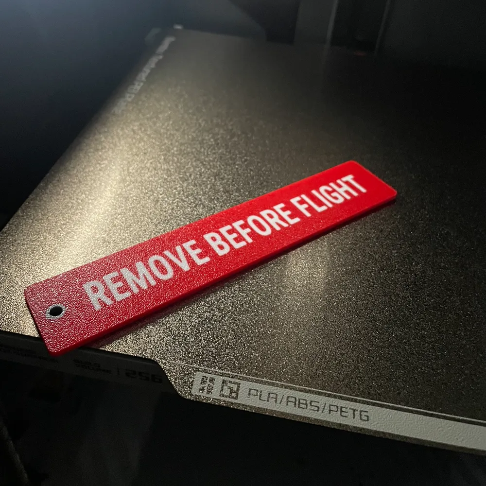 REMOVE BEFORE FLIGHT tag keychain replica by Vega3Dprinting - MakerWorld