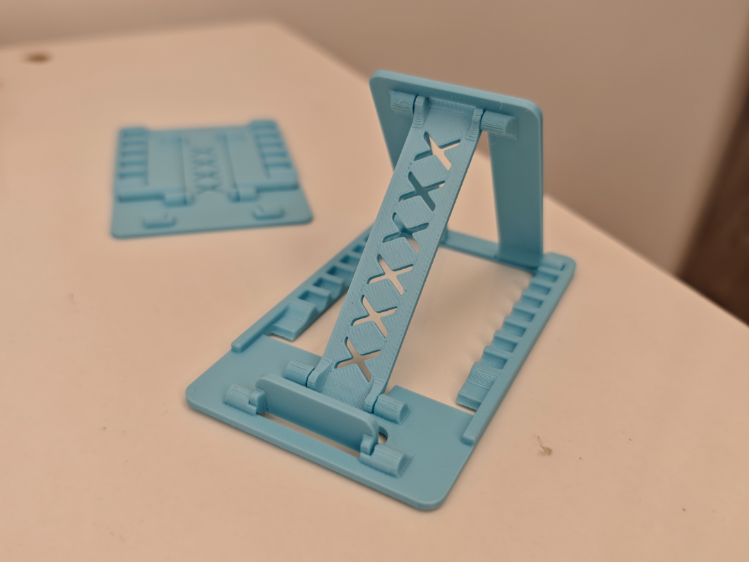 An unremarkable portable folding phone stand by uijx MakerWorld ...