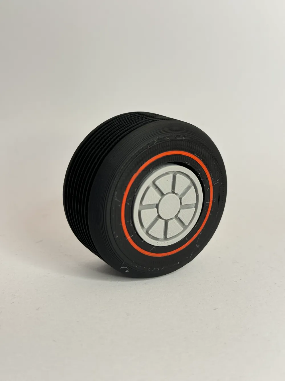 Print-In-Place Spinning F1 Wheel Fidget Toy by Fin3dPrinting - MakerWorld
