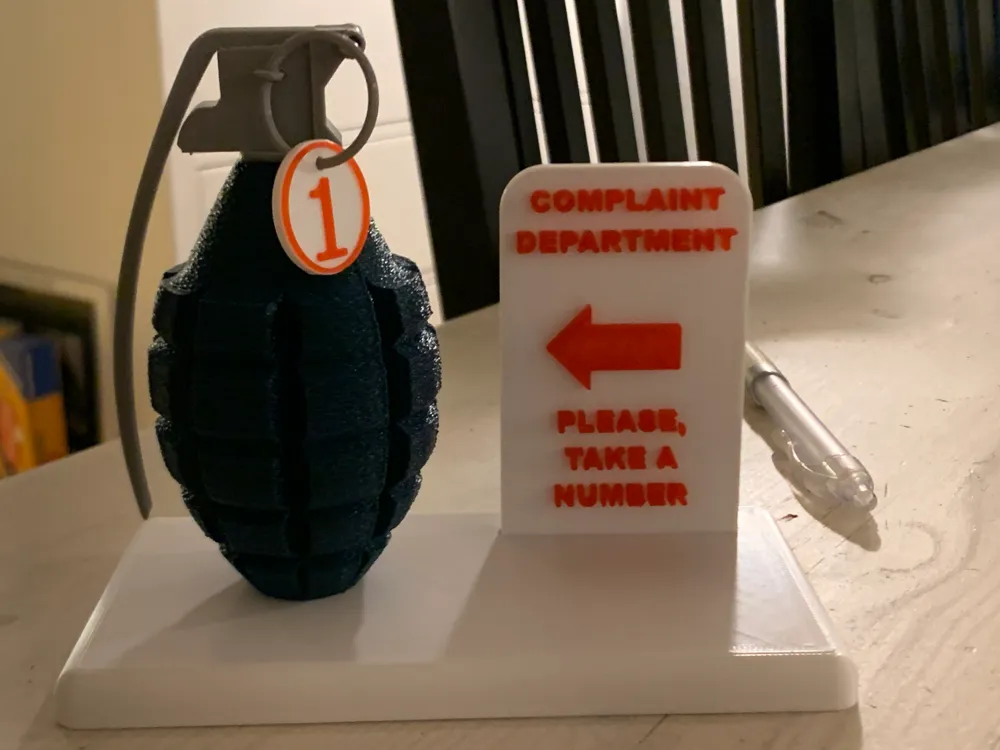 Complaint sign with toy grenade Remixed by 3DRay - MakerWorld