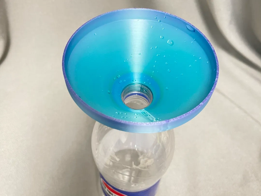 Cola bottle funnel, a funnel that can be screwed onto a cola bottle by ...