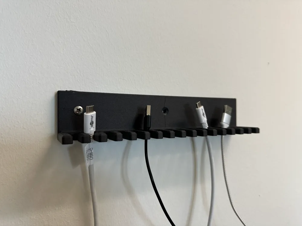 Wall Cable Holder by derjujuman - MakerWorld