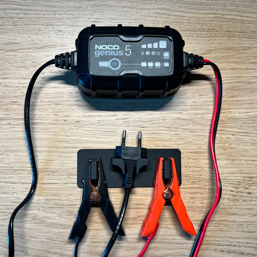 Noco genius trickle charger bracket by Printainius - MakerWorld