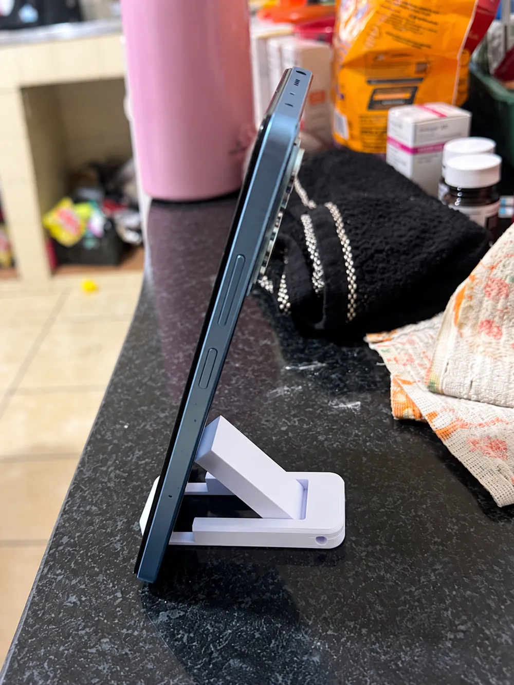 Keychain Phone Holder + Can Opener - Free 3D Print Model - MakerWorld