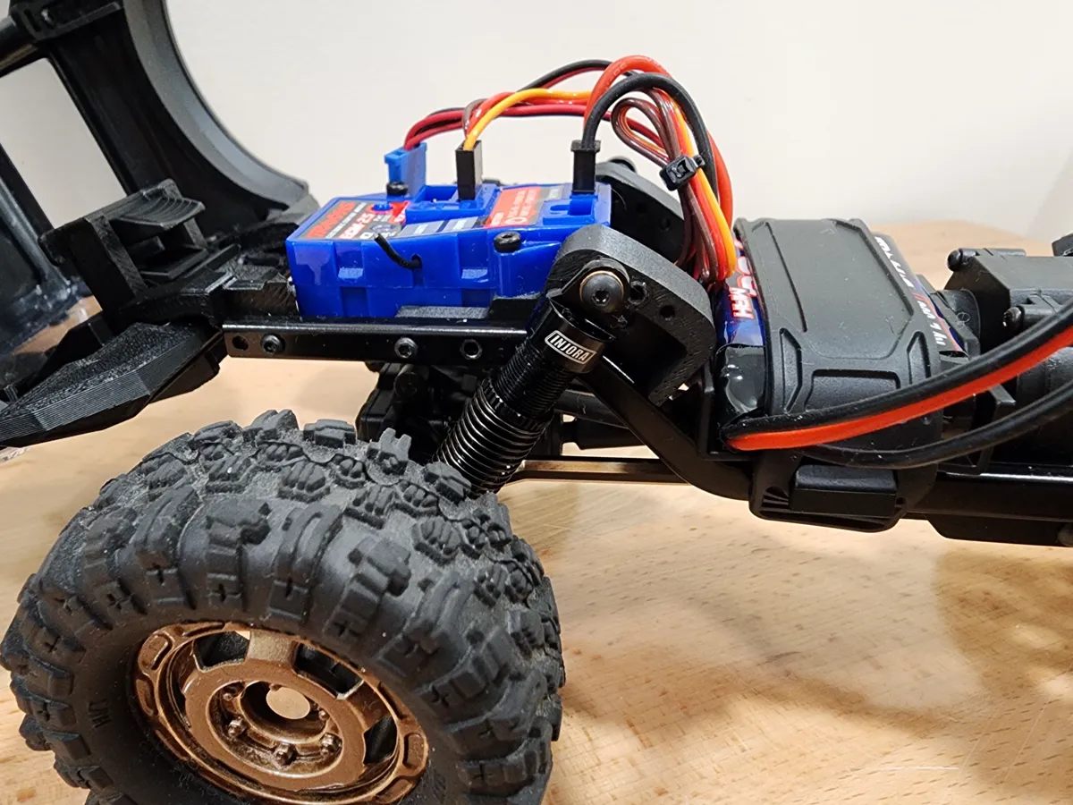TRX4M Rear Shock Mount Relocate - Free 3D Print Model - MakerWorld