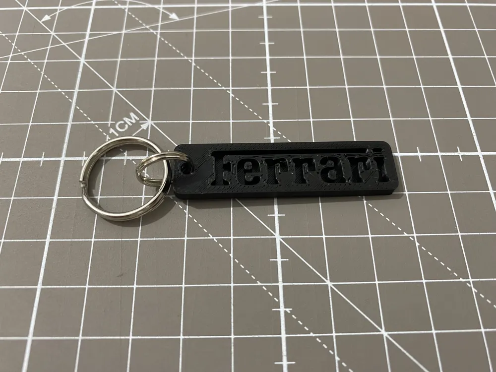 Ferrari single-color perforated keyring - Free 3D Print Model - MakerWorld