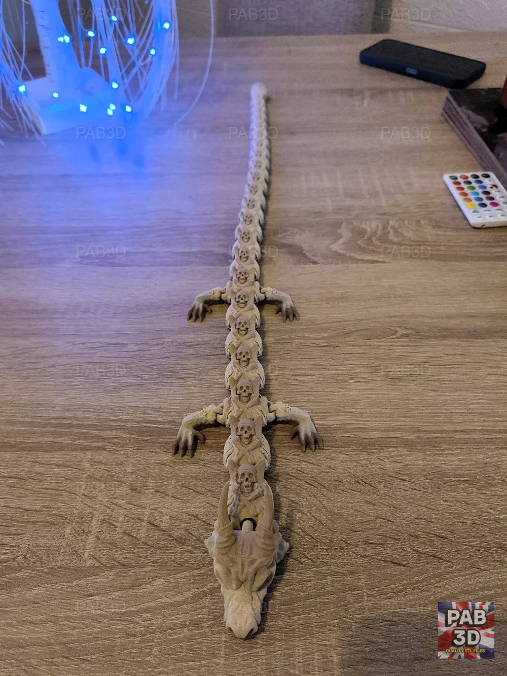 Articulated Flexi dragon skull & bone - Free 3D Print Model - MakerWorld