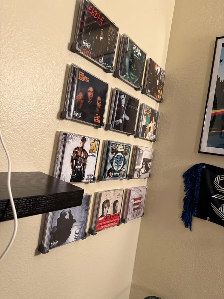 CD wall display - Free 3D Print Model - MakerWorld