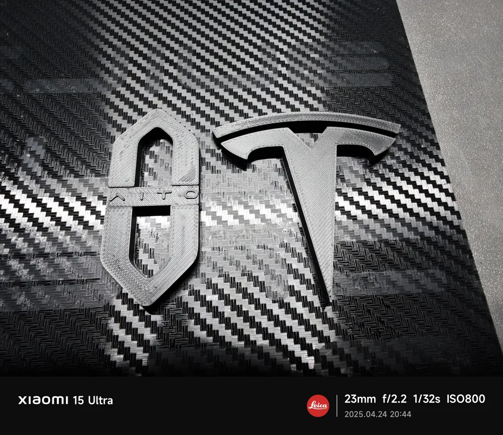 Tesla car logo/blackened logo and tesla lettering (also available in a ...