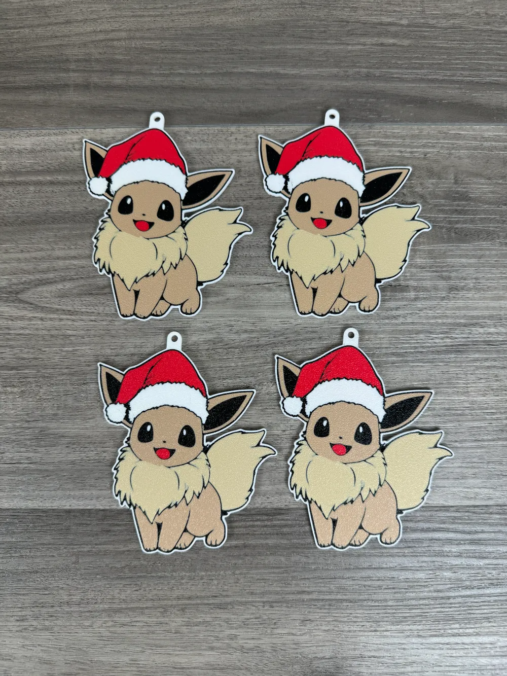 Eevee Santa Hat Christmas Ornament by Canadian Gamer - MakerWorld