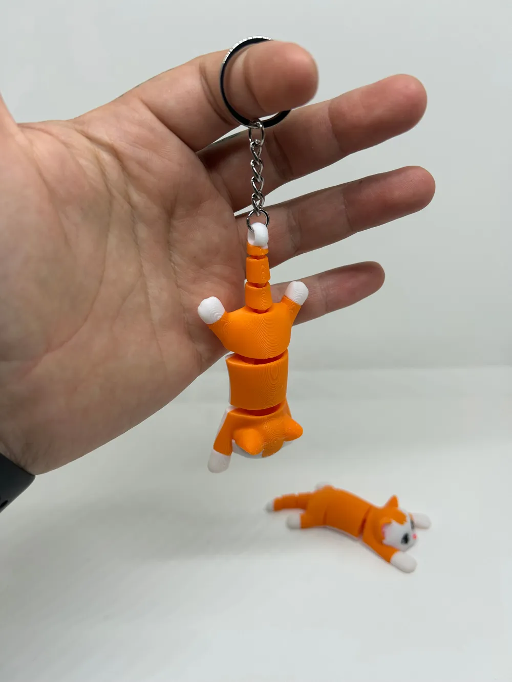 Flexi cat - Toy/Keychain - 2 Versions - Free 3D Print Model - MakerWorld