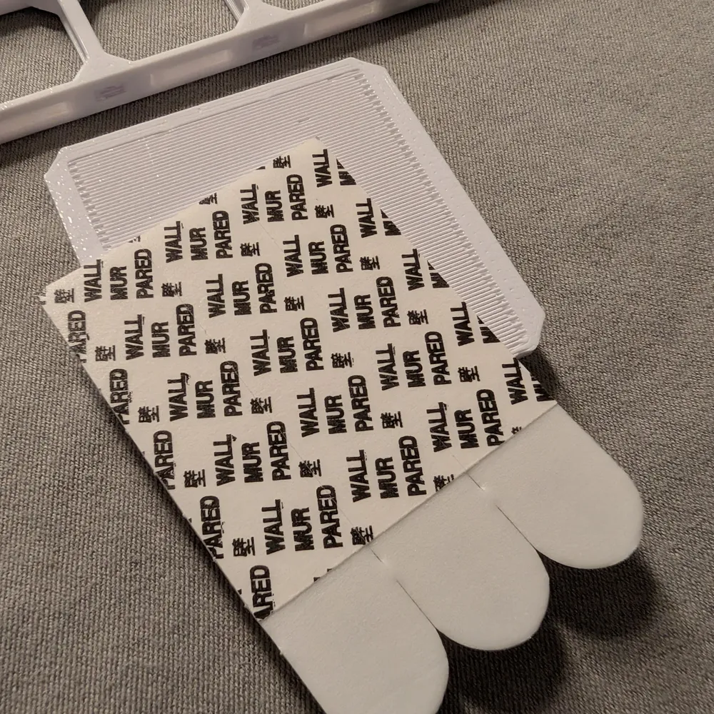 openGrid Locking Command Strip Mount - Free 3D Print Model - MakerWorld