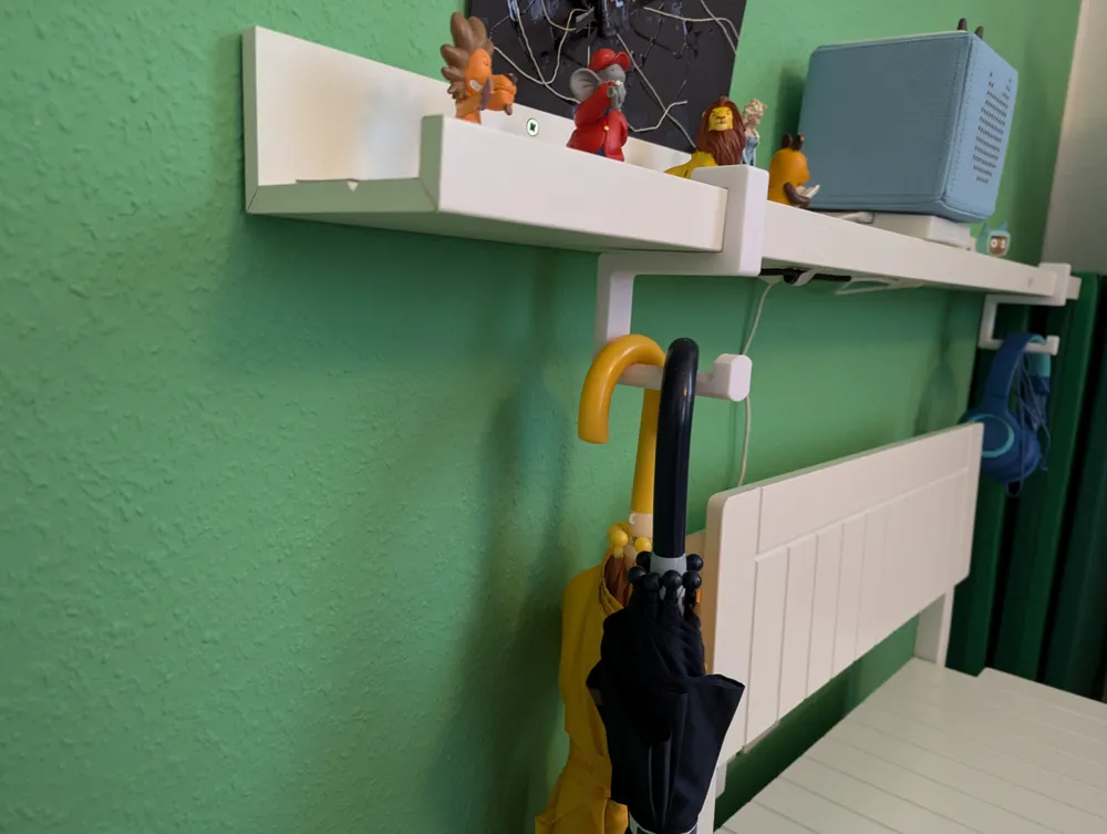 Hook for IKEA Mosslanda ledge/ shelf by CosmicBog - MakerWorld